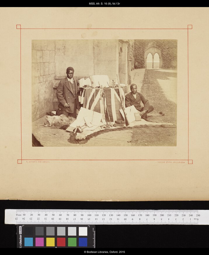 James Chuma and Abdullah Susi Beside Notebooks, Maps, and Other ...